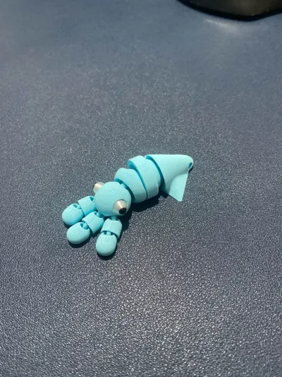 Flexi Cute Squid Keychain by ilya91 MakerWorld: Download Free 3D Models