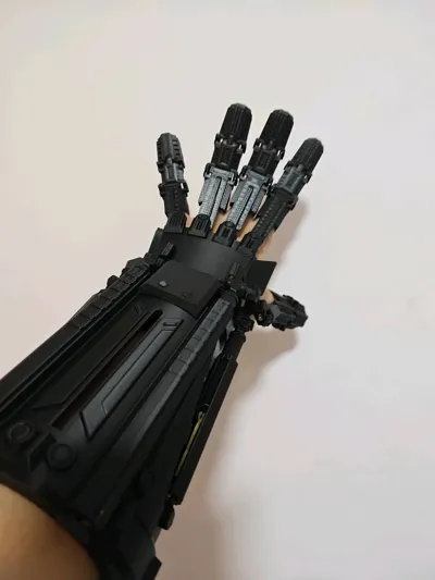 Mechanical exoskeleton arm (left hand) by 小红薯手工人 MakerWorld: Download ...