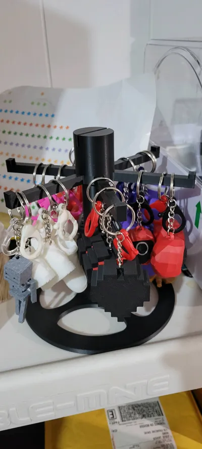 Spinning keychain display stand customizable by Tinker Link MakerWorld ...