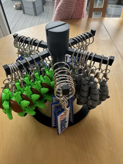 Spinning keychain display stand customizable by Tinker Link MakerWorld ...