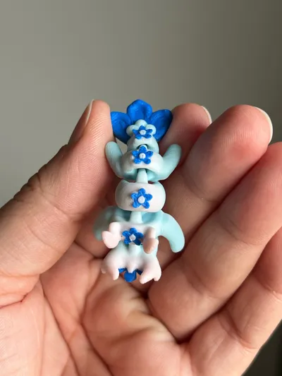 Mini Articulated Spring Dragon by Saber3D MakerWorld: Download Free 3D ...