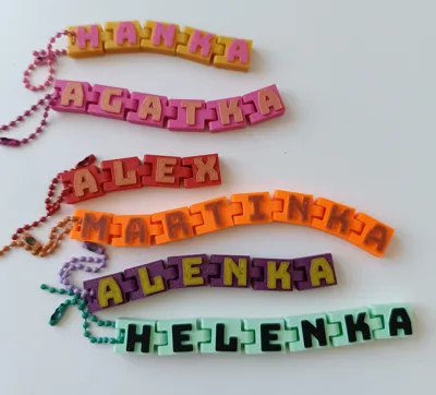 Articulated keychain, with personalized name by Alberto Nicás ...