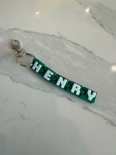 Articulated keychain, with personalized name by Alberto Nicás ...