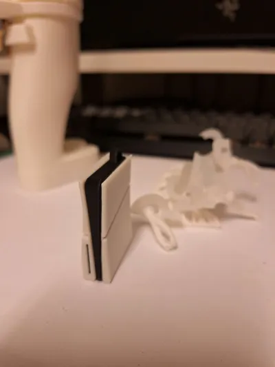 PS5 Keychain by VISMOND GROUP MakerWorld: Download Free 3D Models