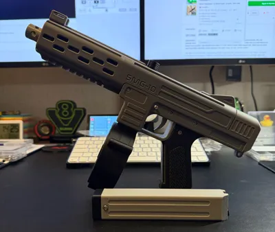 SPCTRM SMG-10: Shell-Ejecting Toy Blaster by BrewBoy MakerWorld: Download Free 3D Models