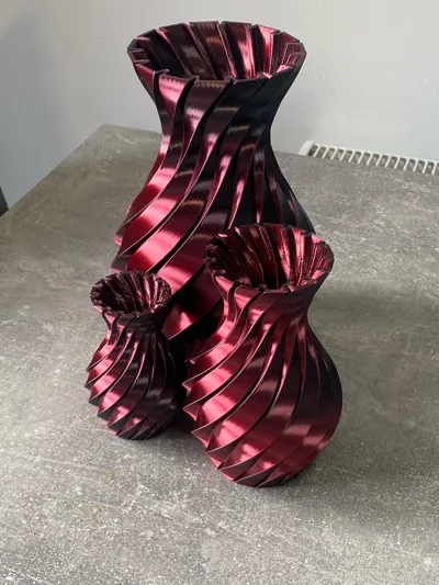 Twisting Pillars Vase - Free 3D Print Model - MakerWorld