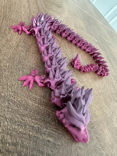 Articulated flexi dragon Tulips - Free 3D Print Model - MakerWorld