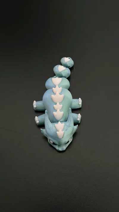 Tiny Cute Dragon Articulated ( Flexi ) - Free 3D Print Model - MakerWorld