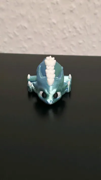 Tiny Cute Dragon Articulated ( Flexi ) - Free 3D Print Model - MakerWorld
