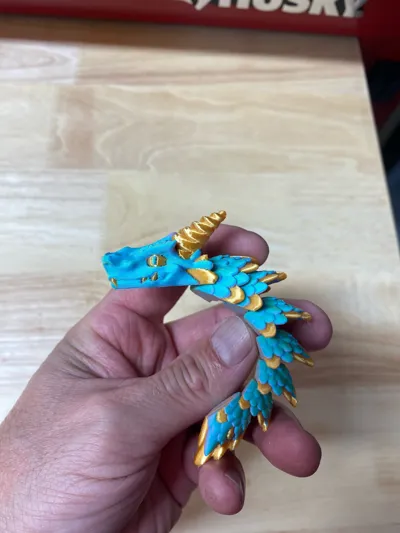 Emberling - Articulated Dragon (+Keychain) by hollowmaker MakerWorld: Download Free 3D Models