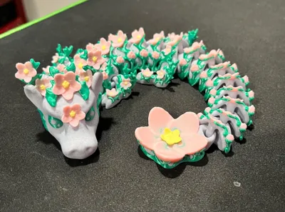 Blossom Articulated Dragon - By Vixvvo3D - Free 3D Print Model - MakerWorld