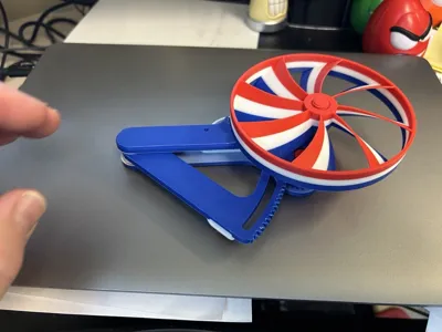 Squeeze Powered Flywheel Fan - Free 3D Print Model - MakerWorld