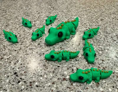 Mini Crocodile - Articulated & Keychain - Free 3D Print Model - MakerWorld
