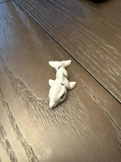 Mini Articulated Dolphin - Free 3D Print Model - MakerWorld