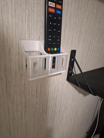 Remote control holder (print in place) by Mr_Andre MakerWorld: Download Free 3D Models