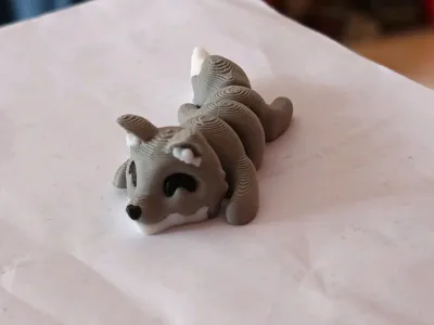 Mini Articulated Wolf - Free 3D Print Model - MakerWorld