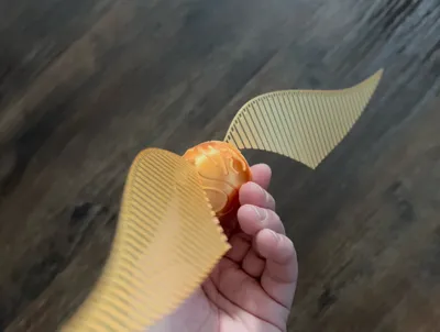 Golden Snitch with flexible wings - Free 3D Print Model - MakerWorld