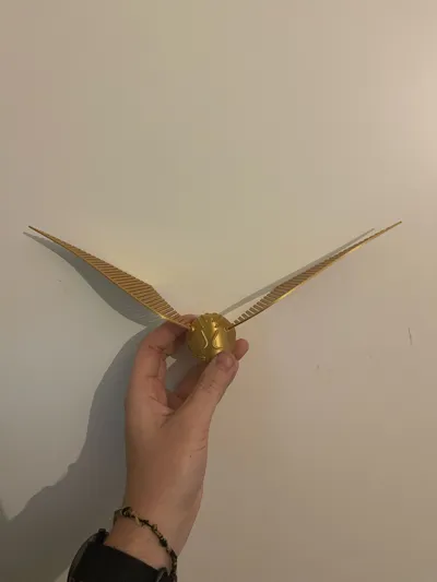 Golden Snitch with flexible wings - Free 3D Print Model - MakerWorld