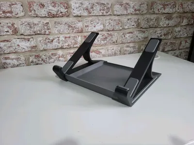 Sleek padded Laptop Stand (+PSU Storage) - Free 3D Print Model - MakerWorld