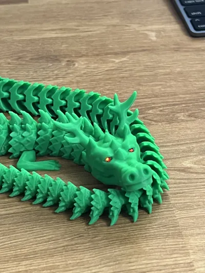 Articulated Christmas Dragon Shared by SmarTiks MakerWorld: Download ...