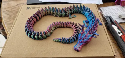 Articulated Christmas Dragon Shared by SmarTiks MakerWorld: Download ...