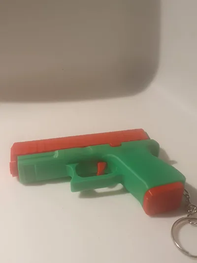 Glock Fidget Keychain – Slide-Action Toy - Free 3D Print Model - MakerWorld