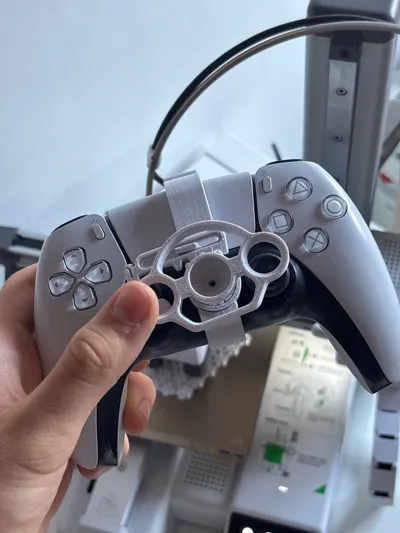 Playstation 5 Controller Mini Wheel Remixed by dekrugMakerWorld ...