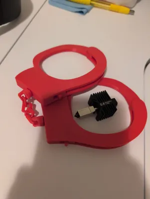 Handcuffs toy by Mc2.project3D MakerWorld: Download Free 3D Models