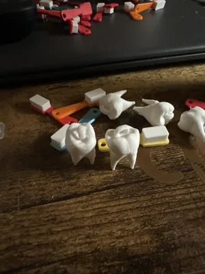 Tooth Keychain Remixed by Wolfie MakerWorld: Download Free 3D Models