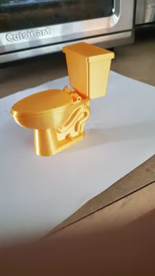 The Golden Toilet by Julia Ebert - MakerWorld