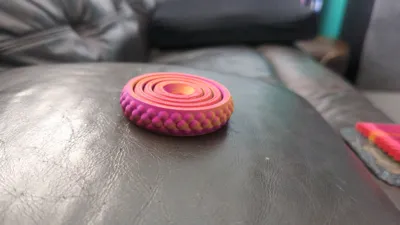 The pretty neat 4-ring fidget spinner gyro by MoltenPlasticNuts ...