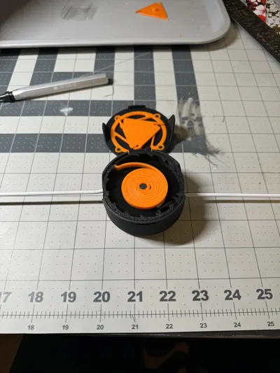 Retractable Cable Organizer - With Stop - Free 3D Print Model - MakerWorld