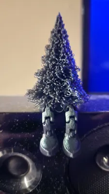 Christmas tree with legs by Loomio MakerWorld: Download Free 3D Models