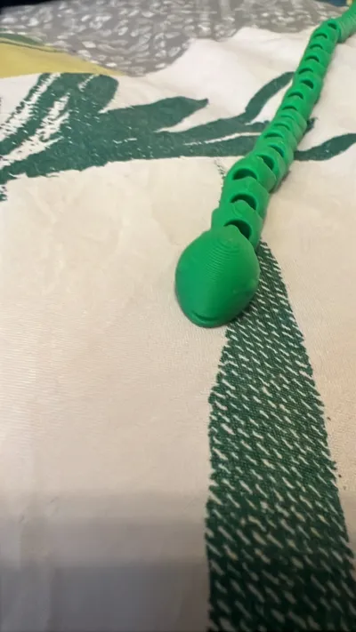 Tiny Flexi Snake 'The Extra Long One' by Paulies Prints MakerWorld ...
