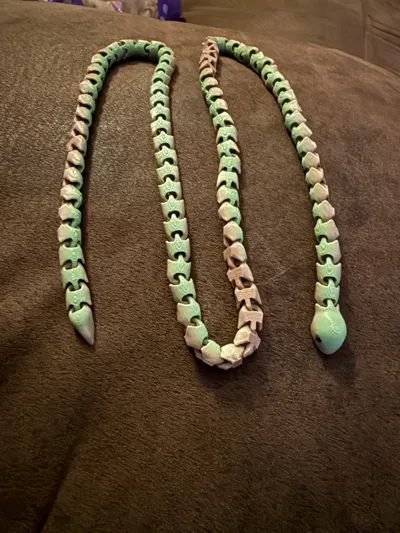 Tiny Flexi Snake 'The Extra Long One' by Paulies Prints MakerWorld ...