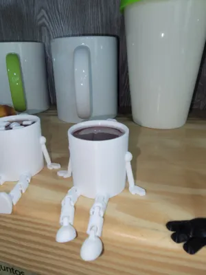 Coffee mug with articulated legs by Torbjorn16 MakerWorld: Download ...