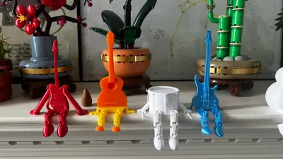 Make your own band - Articulated Guitar buddy - Free 3D Print Model ...