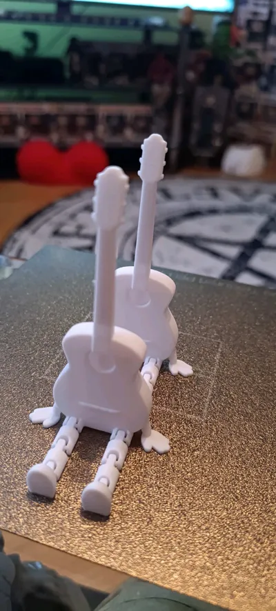 Make your own band - Articulated Guitar buddy - Free 3D Print Model ...