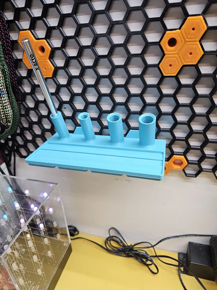 Honeycomb storage wall (HSW) Xacto holder Remixed by chuckr - MakerWorld