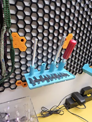 Honeycomb storage wall (HSW) Xacto holder Remixed by chuckr - MakerWorld