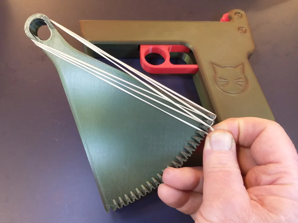 Rubber Band Shooter with 21 Slot Magazine - Free 3D Print Model ...