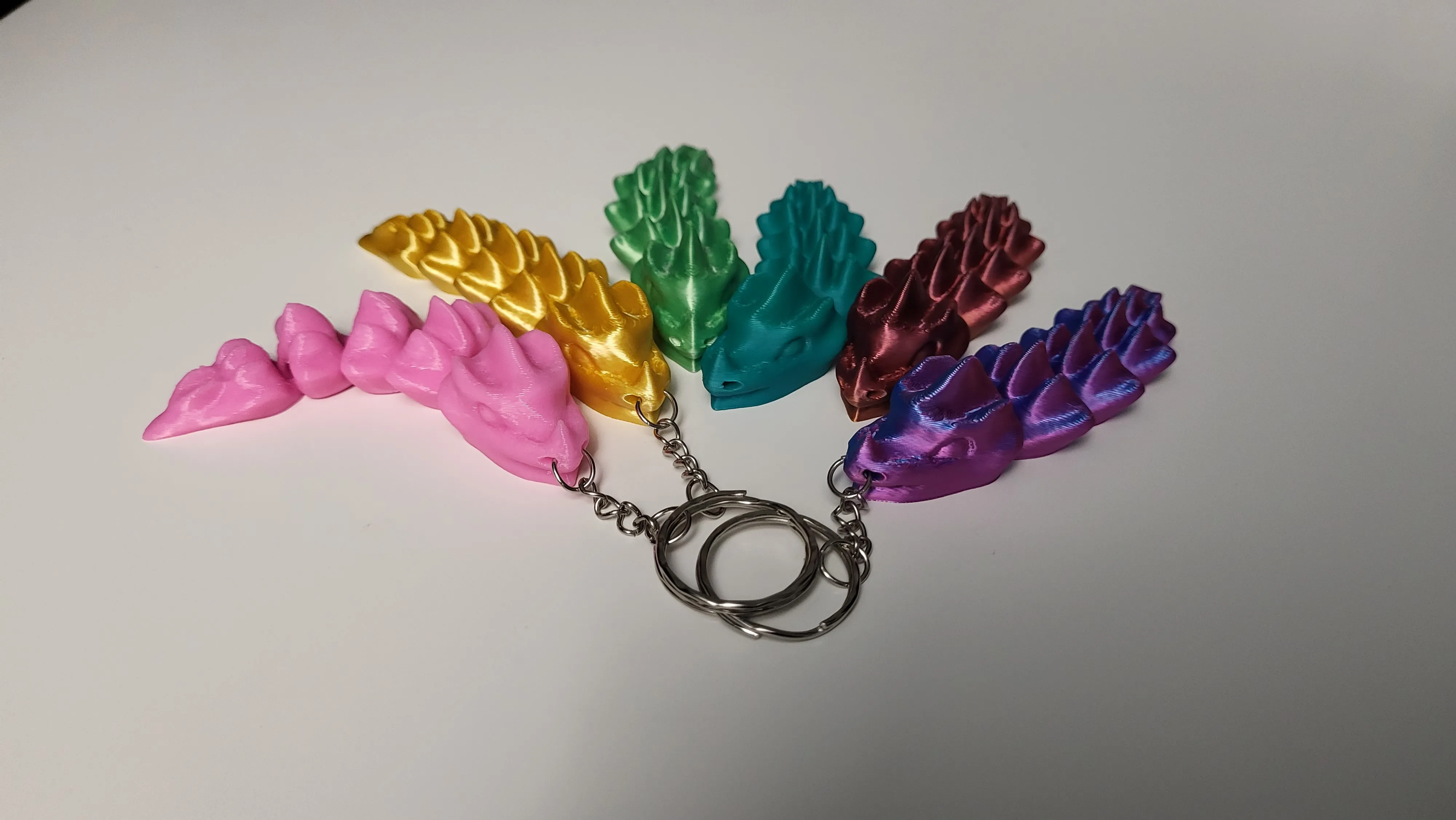Daze Dragon Key Chain | KC002 - Free 3D Print Model - MakerWorld