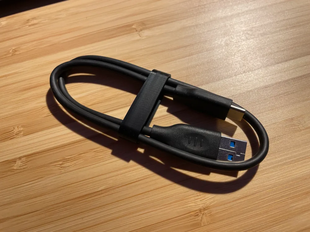 Samsung T7 SSD cable holder by mtl-qc - MakerWorld