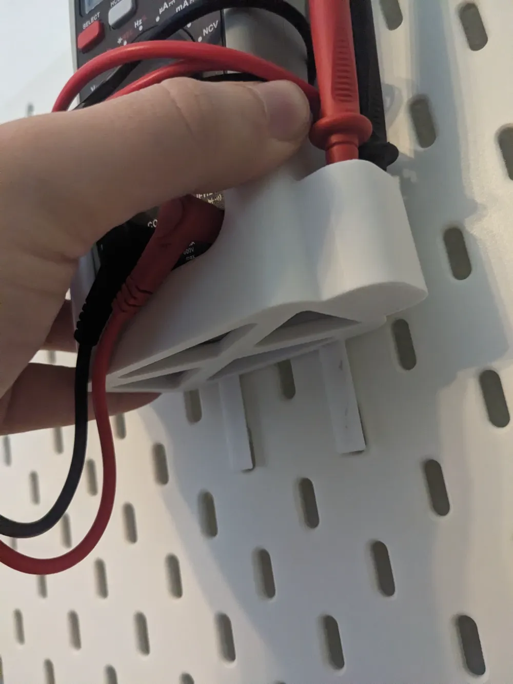 Skadis Multimeter Holder (Minimal Support) by nicolo.luescher - MakerWorld