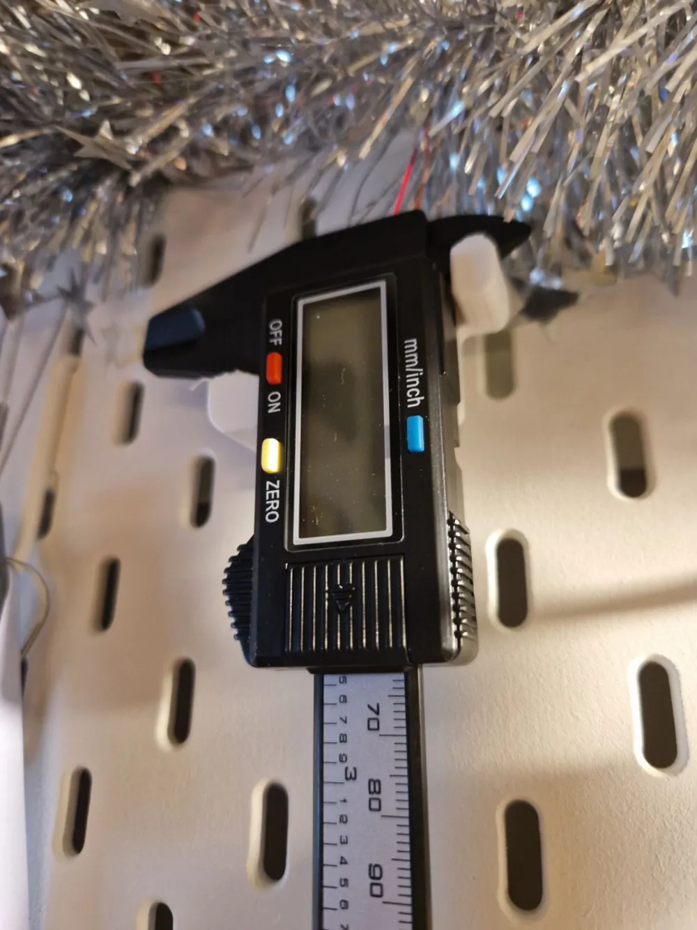 Digital Caliper Holder for Skadis pegboard by Kaylon - MakerWorld