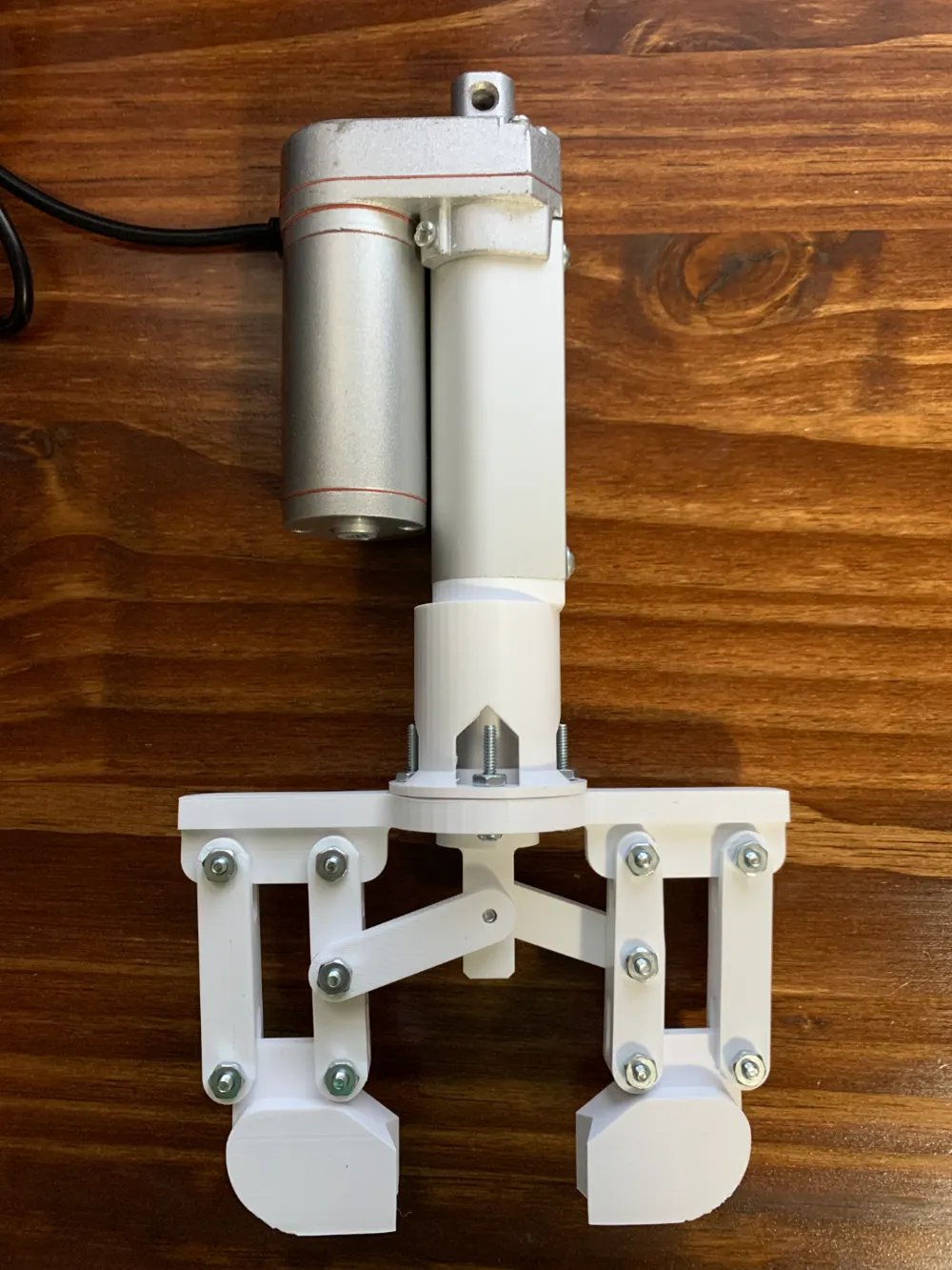 Kinematic Linear Actuator Gripper by Jefferson Mai - MakerWorld