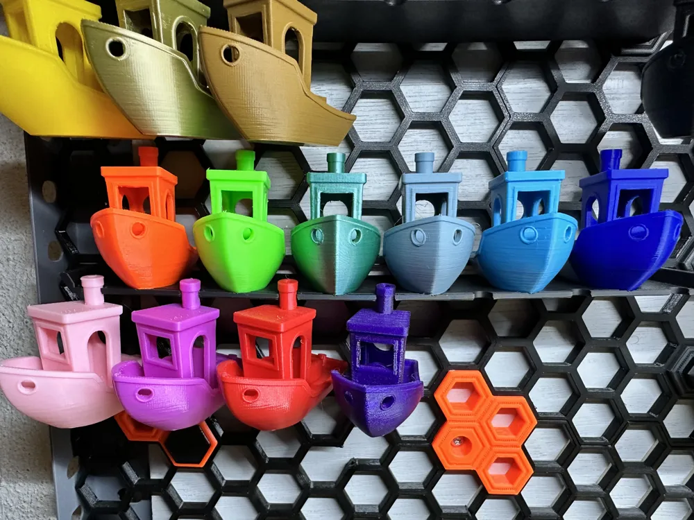 Honeycomb Wall Benchy HSW Shelf Remixed by Torikami - MakerWorld
