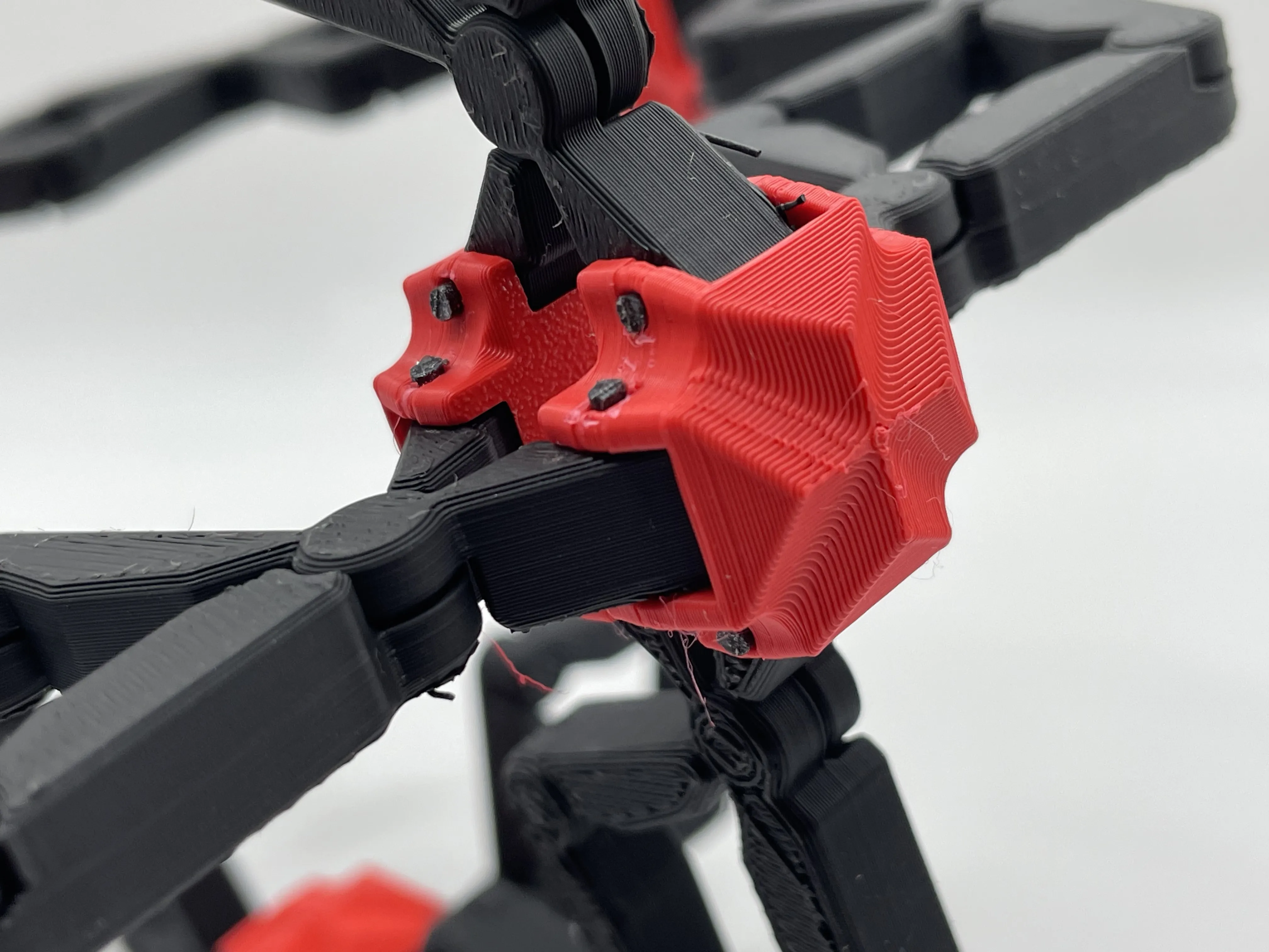 Then put connectors onto all four loose ends of one linking mechanism ...