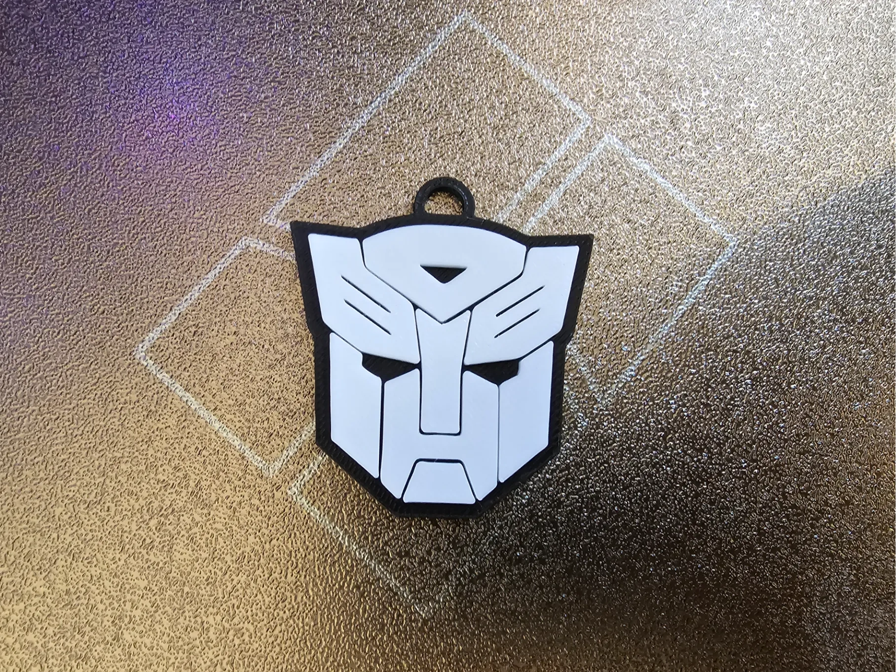 Transformers Autobot Keychain by Ricard0x - MakerWorld