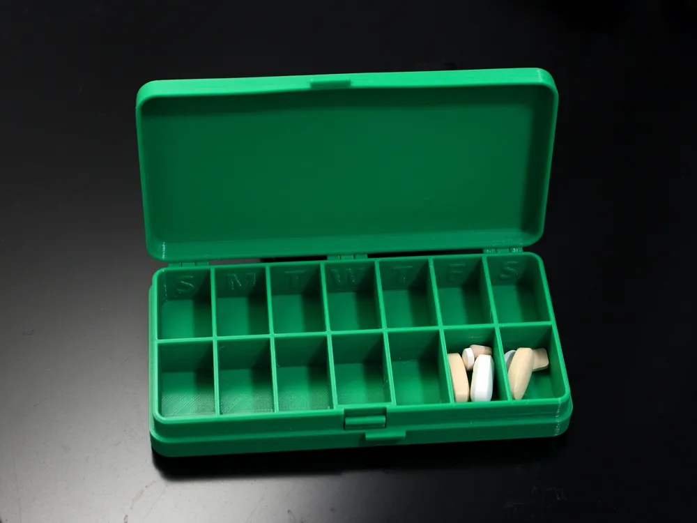 Larger weekly pill box Remixed by Julia Ebert MakerWorld: Download Free 3D Models